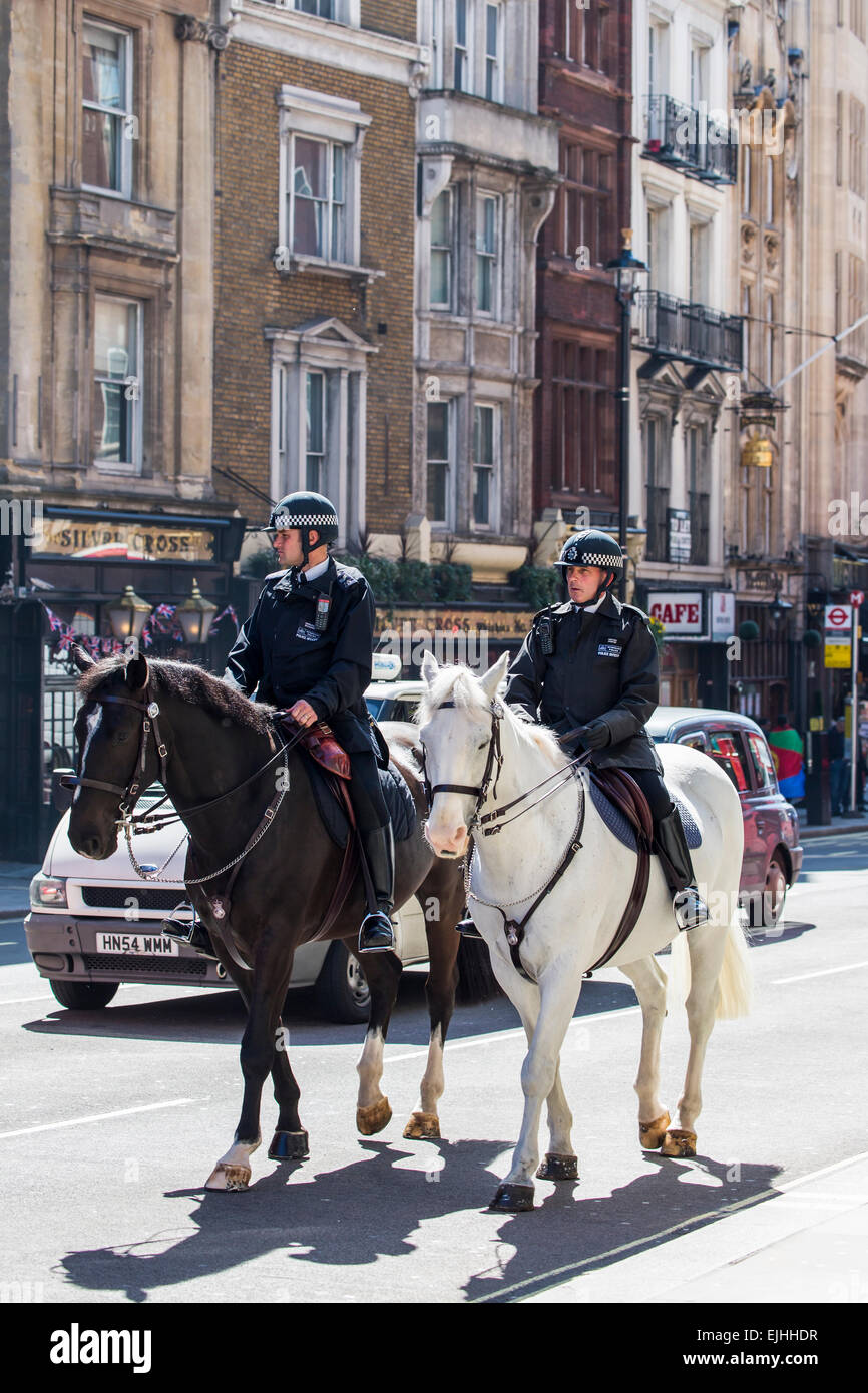 Mounted Metropolitan police on Whitehall near Trafalgar Square, London ...
