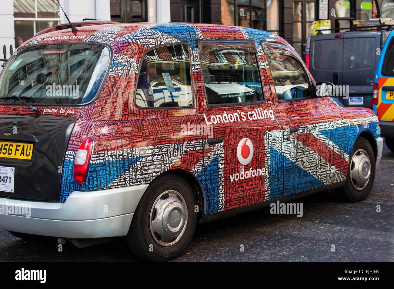 London cab with advertising, London, England Stock Photo - Alamy