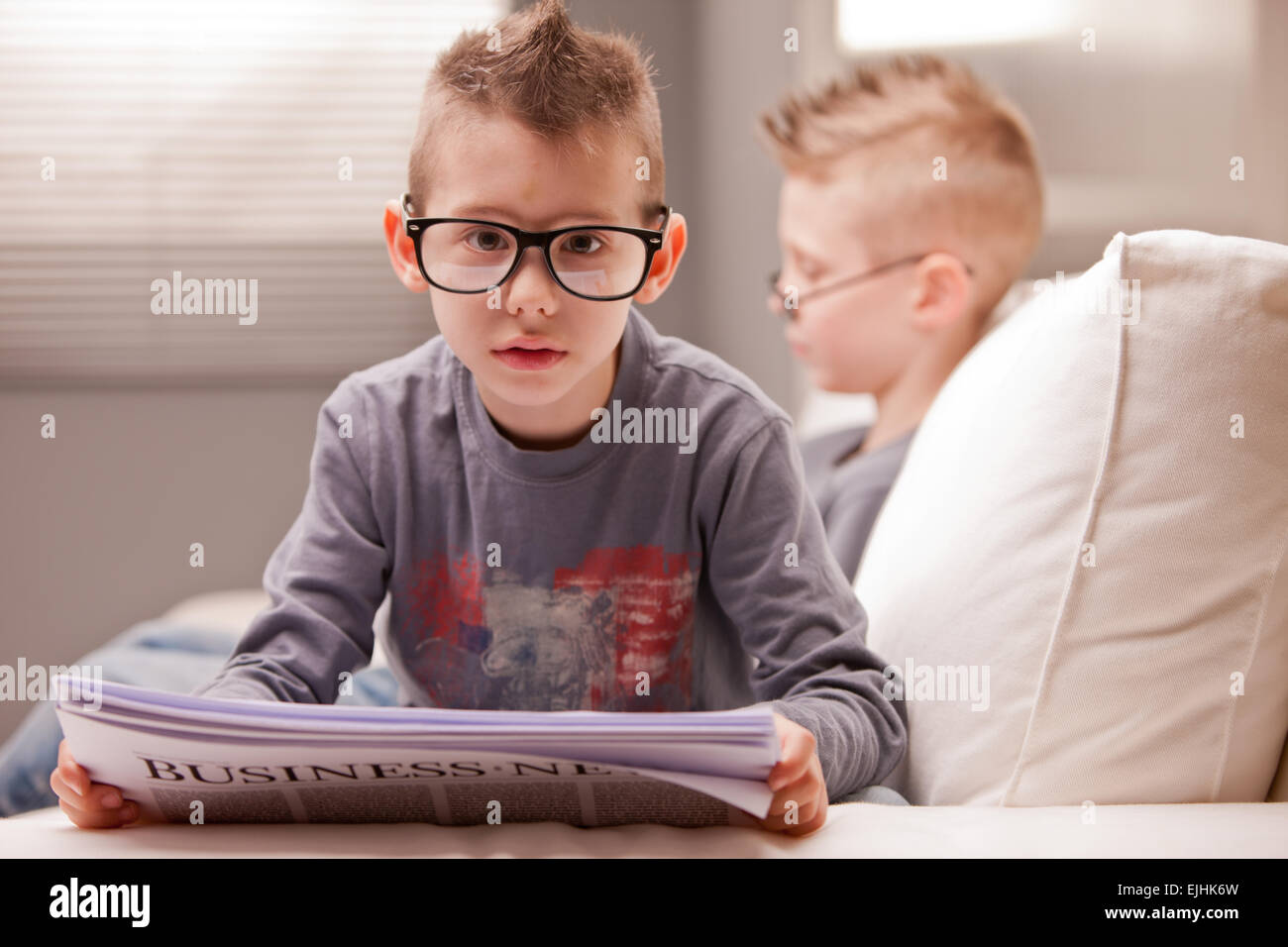 little business baby reading shocking news ready to face the shock ...