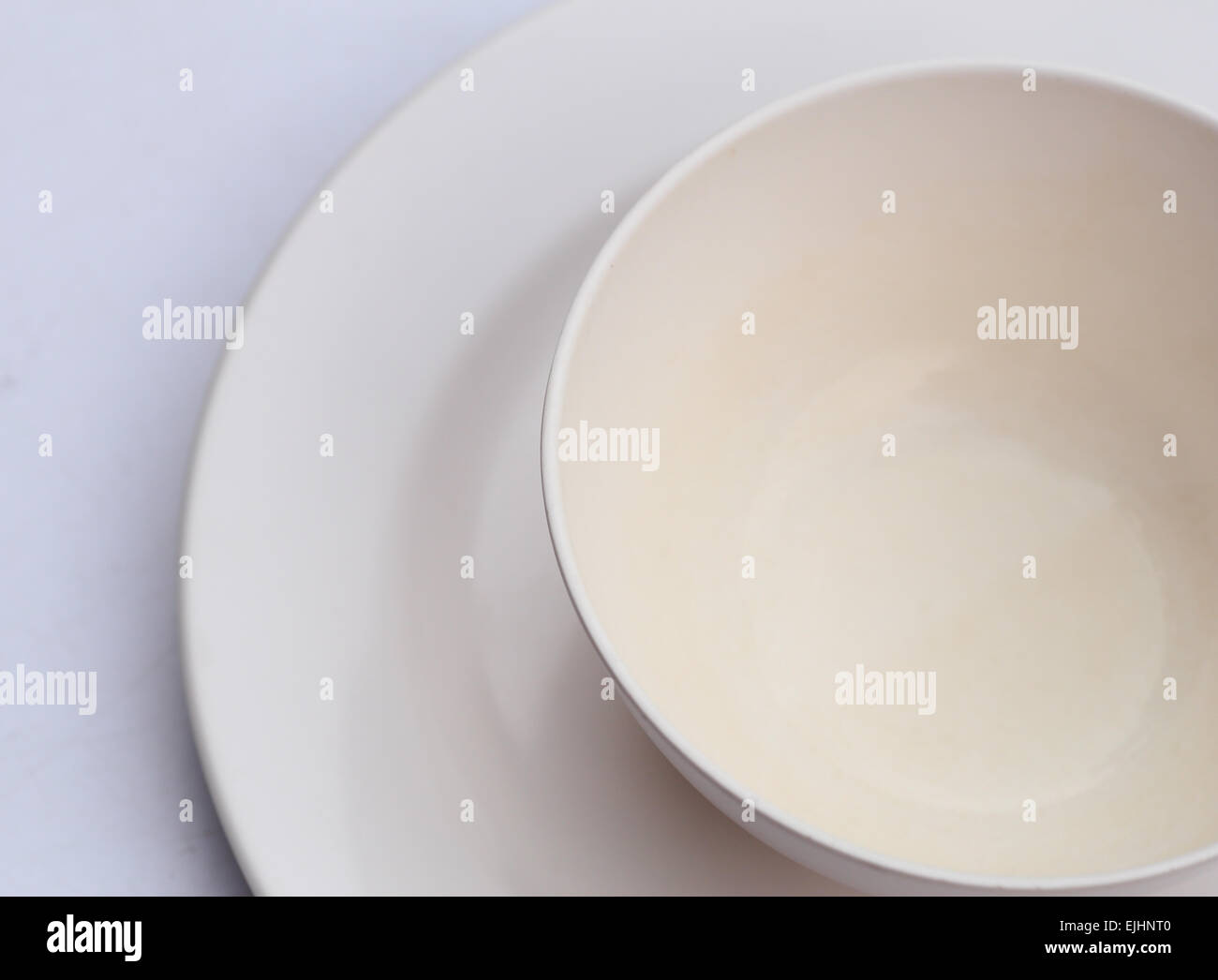 set of bowl with plate on white table Stock Photo - Alamy