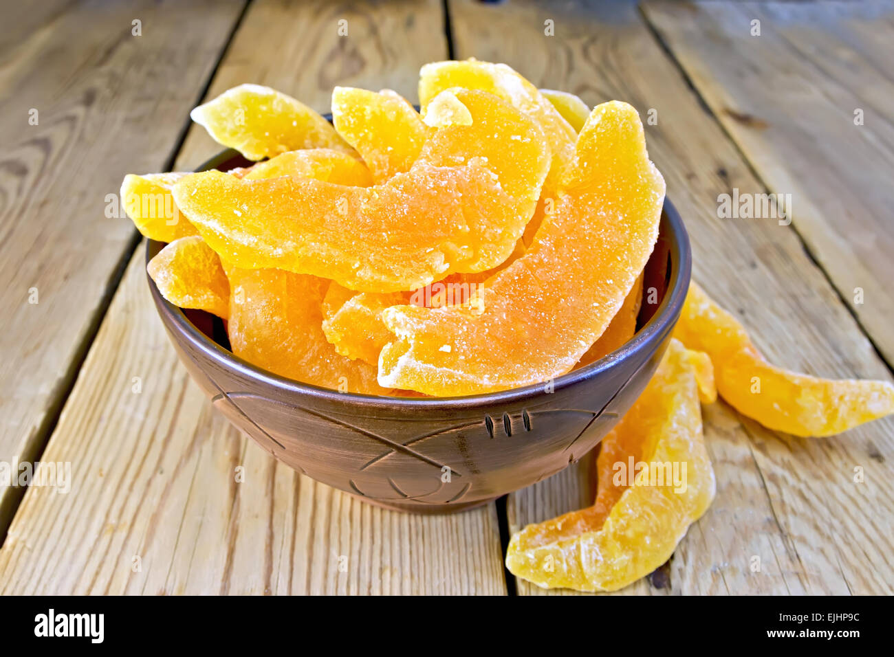 Candied melon in bowl on board Stock Photo - Alamy