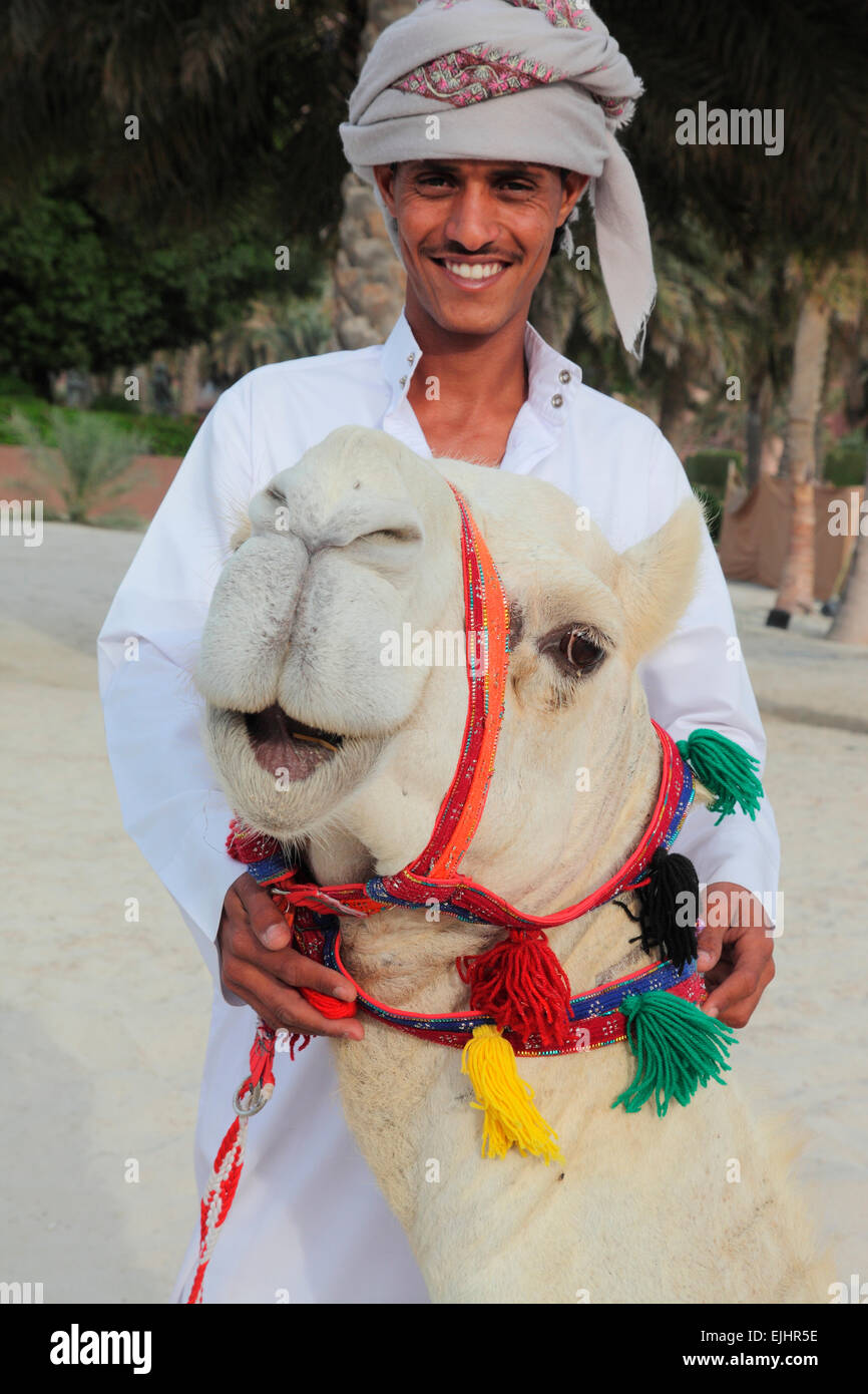 Camel keeper Reuben and Abiet at the Emirates Palace Abu Dhabi Stock ...