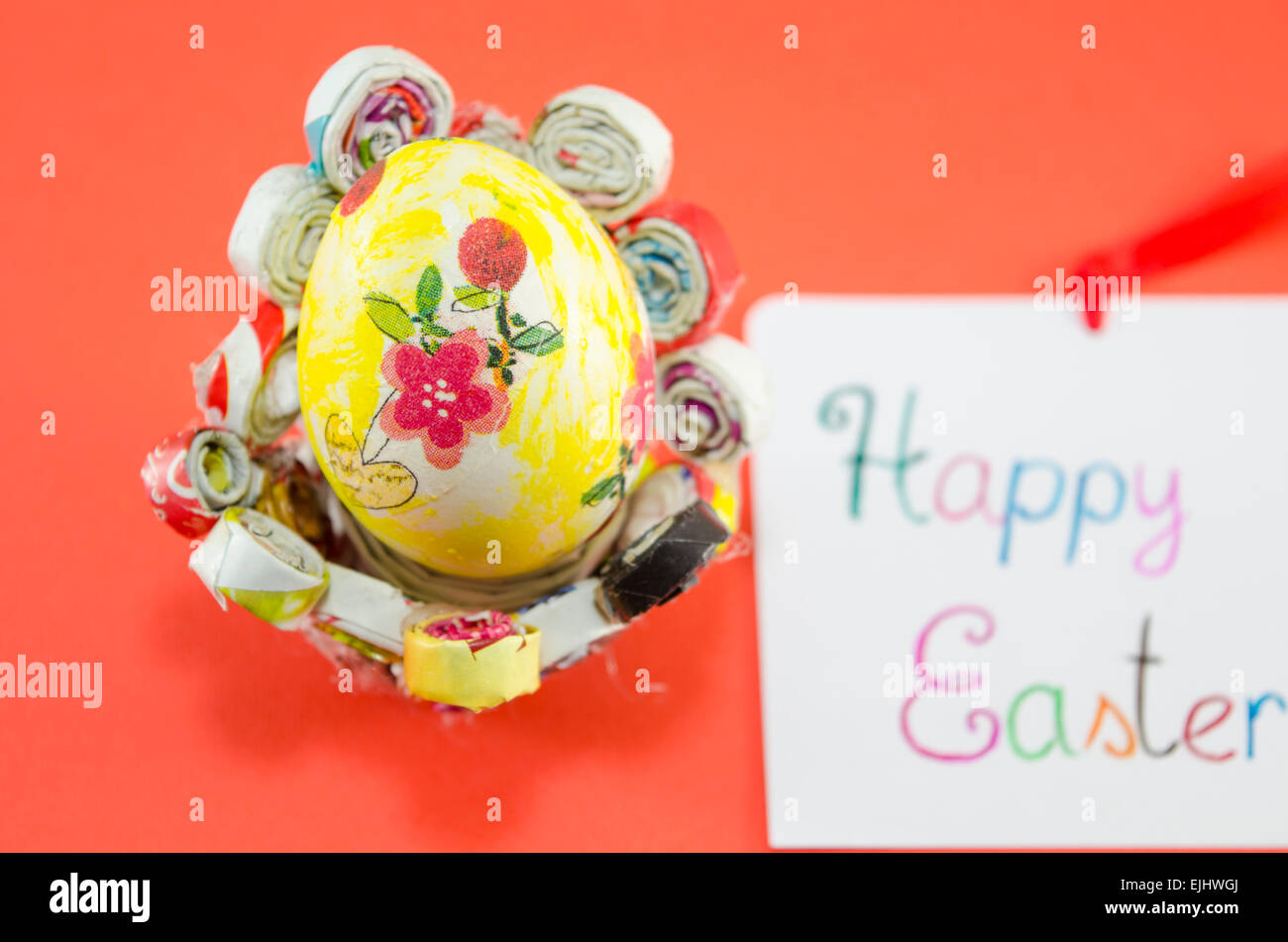 Handmade decoupage Easter egg on a handmade paper plate with a Happy ...
