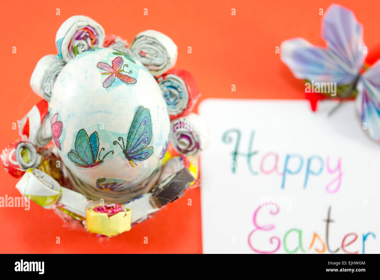 Handmade decoupage Easter egg on a handmade paper plate with a Happy ...