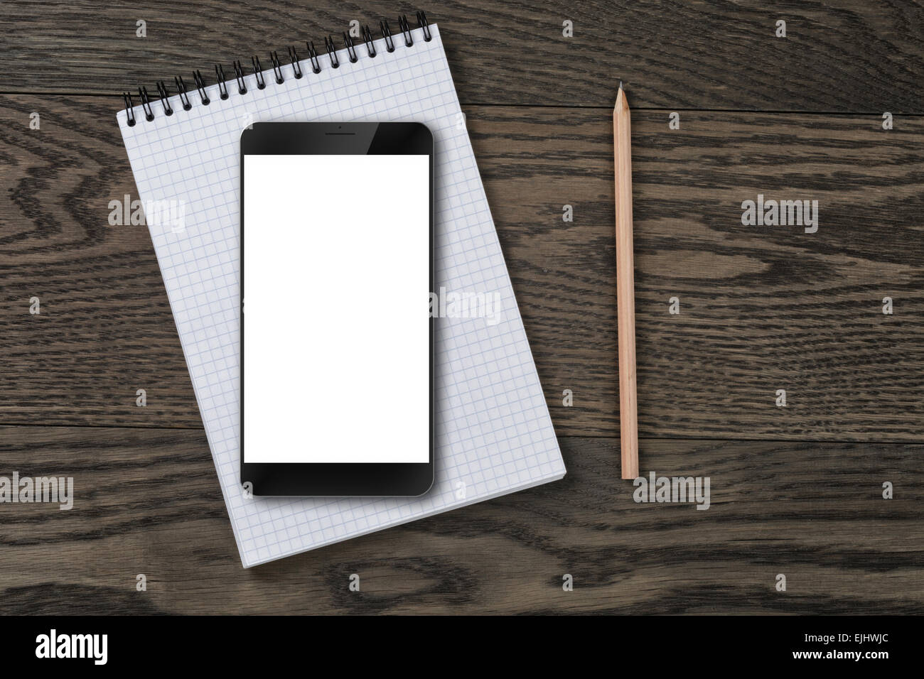 generic modern smartphone on notepad with pencil Stock Photo - Alamy