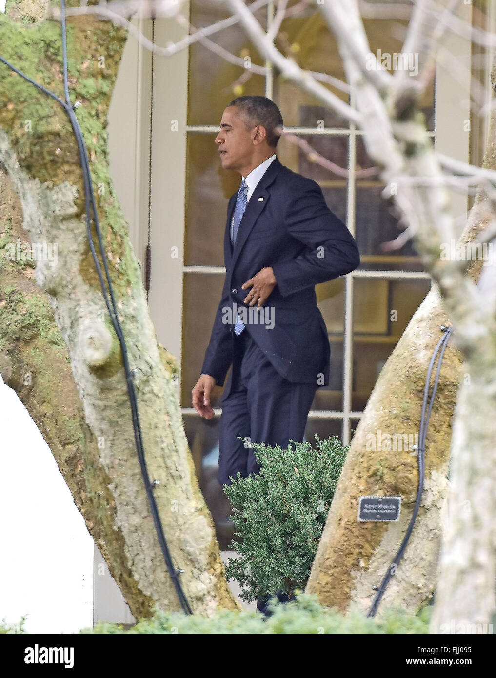 United States President Barack Obama leaves the Oval Office as he ...