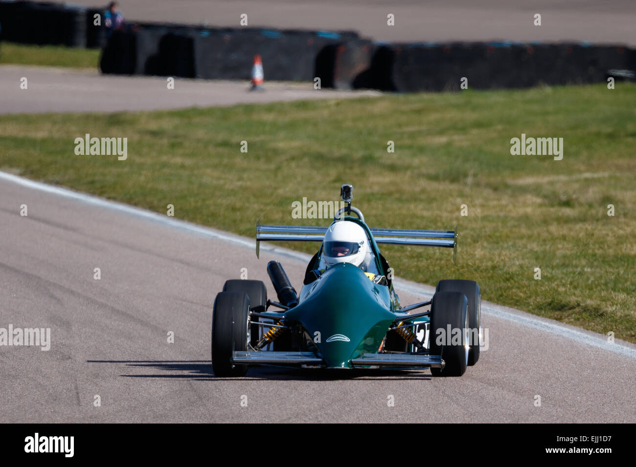 A car taking part in the BARC sprint at Rockingham Motor Speedway Stock ...