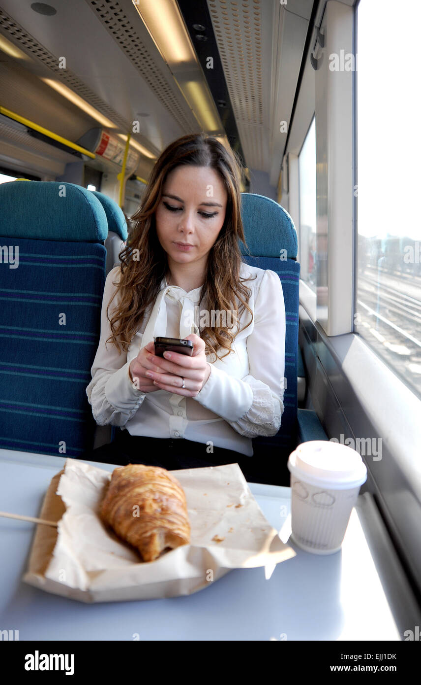 Young woman train commuter text hi-res stock photography and images - Alamy