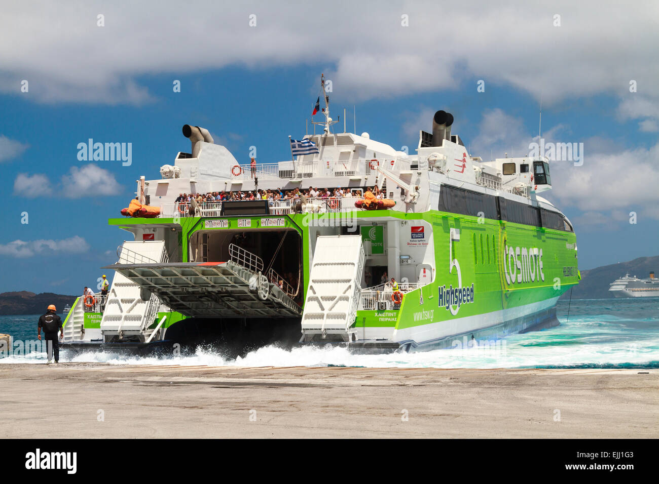 SANTORINI, GREECE - MAY 30, 2014: Huge green and white highspeed ferry ...