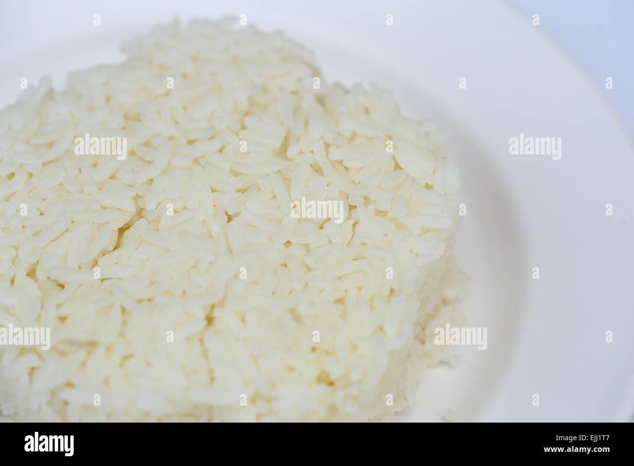 rice on white plate in the restaurant Stock Photo - Alamy