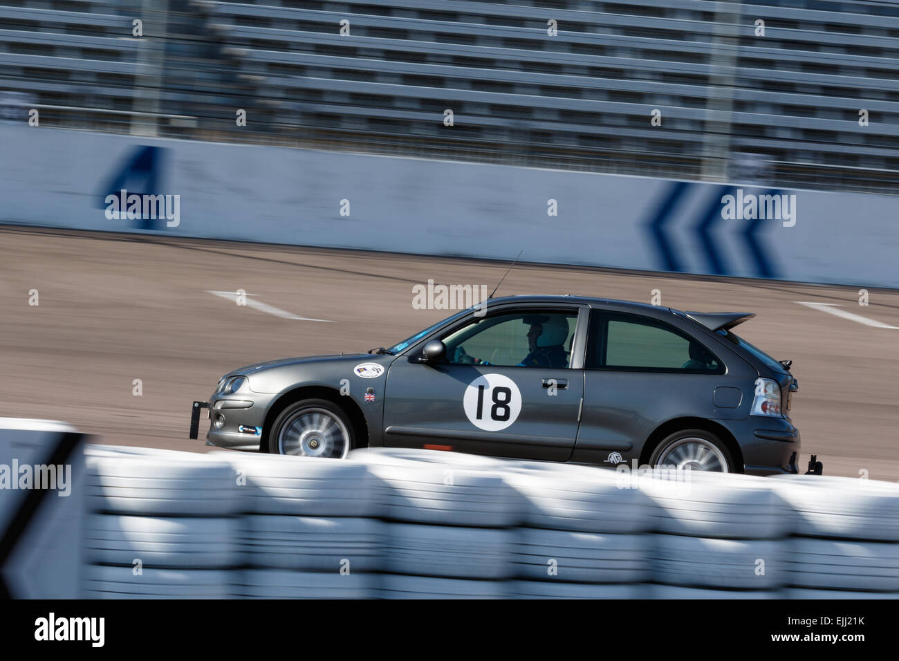 A car taking part in the BARC sprint at Rockingham Motor Speedway Stock ...