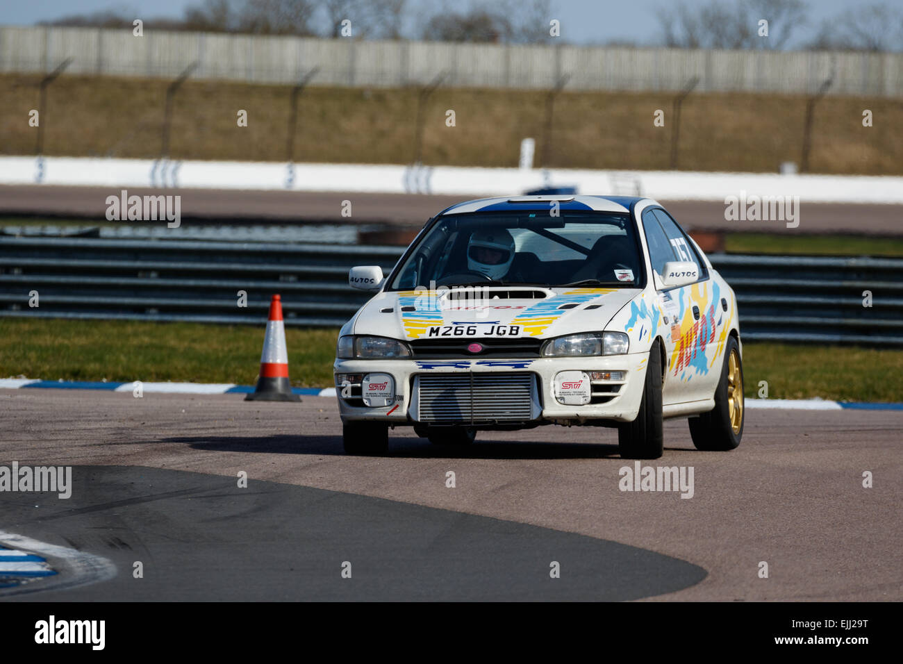 A car taking part in the BARC sprint at Rockingham Motor Speedway Stock ...
