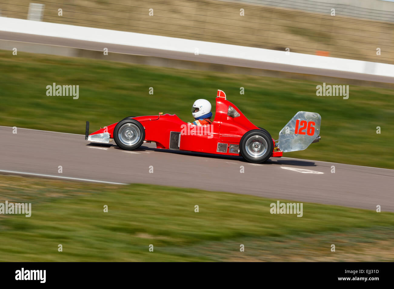 A car taking part in the BARC sprint at Rockingham Motor Speedway Stock ...