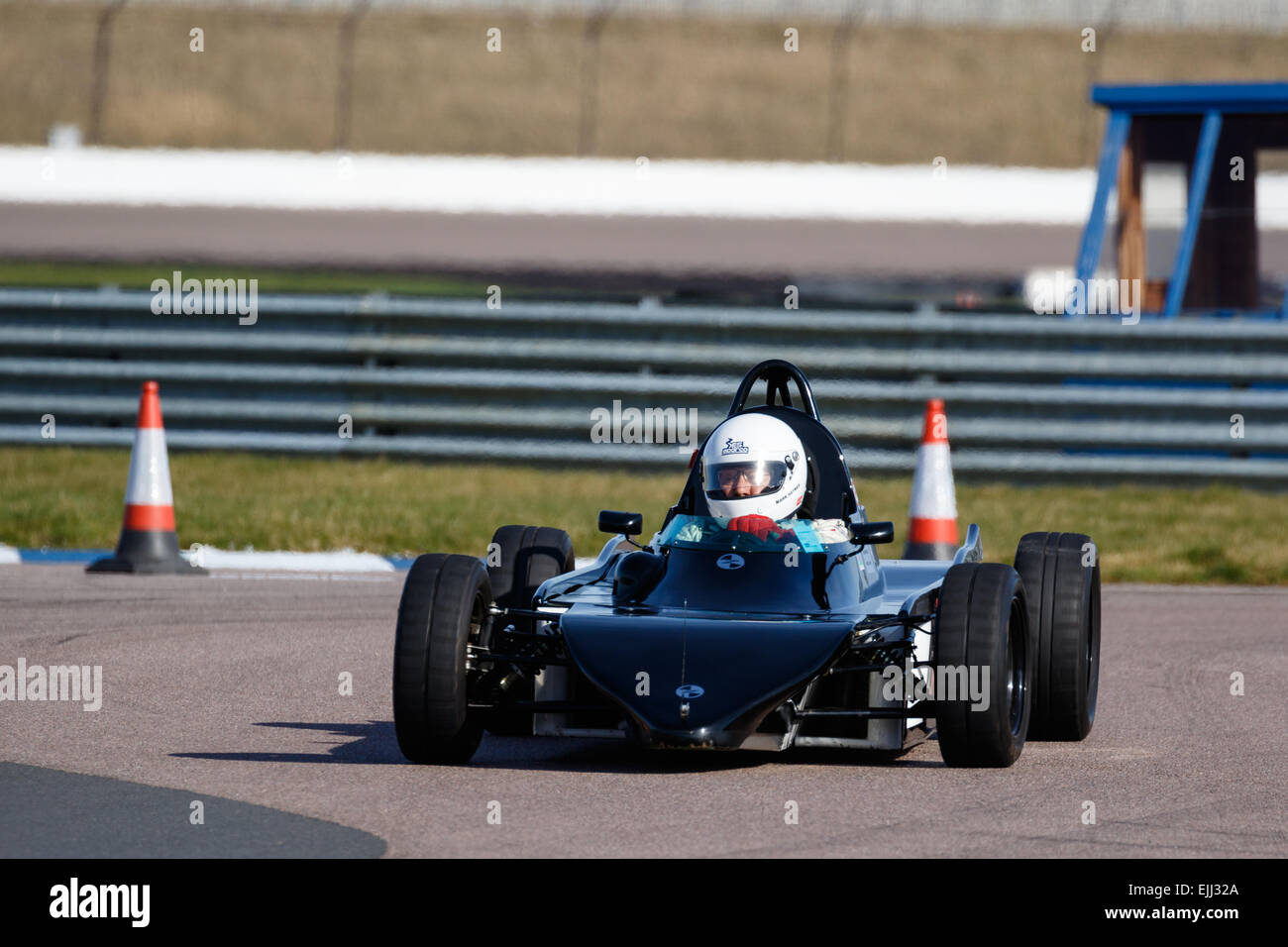 A car taking part in the BARC sprint at Rockingham Motor Speedway Stock ...