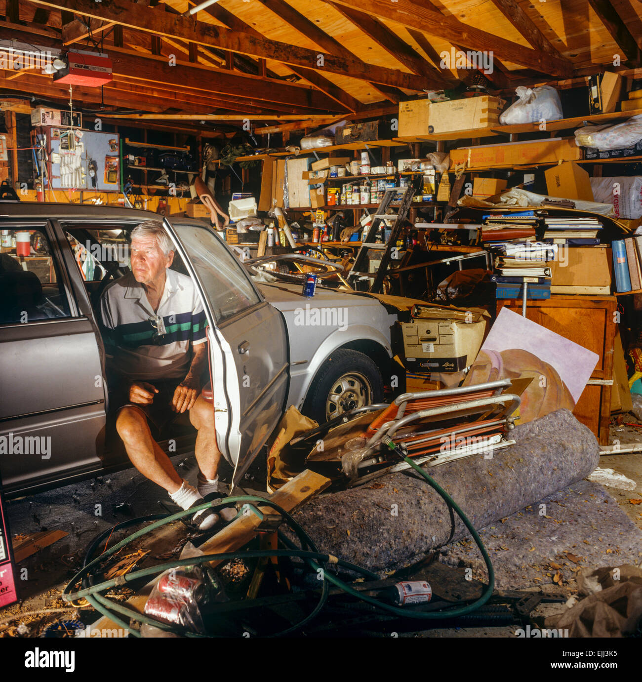 LOS ANGELES, CA – OCTOBER 1: People surrounded with clutter in their ...