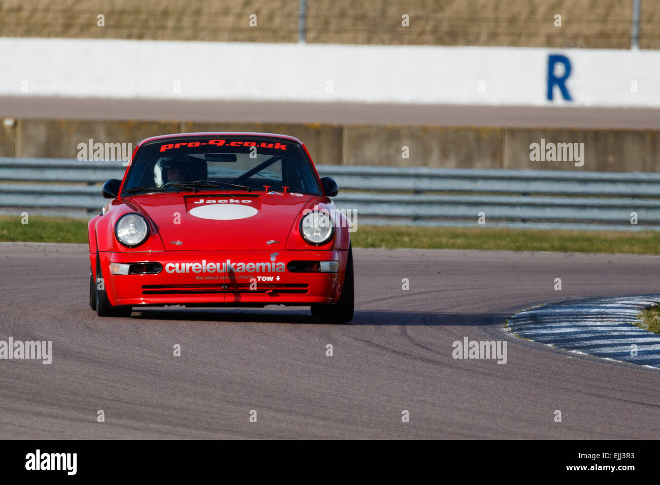 A car taking part in the BARC sprint at Rockingham Motor Speedway Stock ...