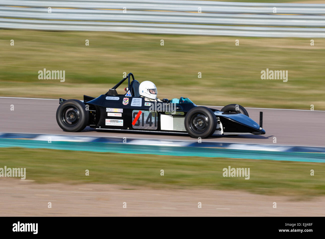 A car taking part in the BARC sprint at Rockingham Motor Speedway Stock ...