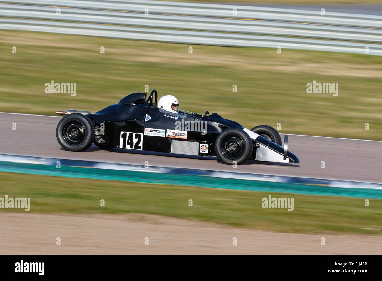 A car taking part in the BARC sprint at Rockingham Motor Speedway Stock ...