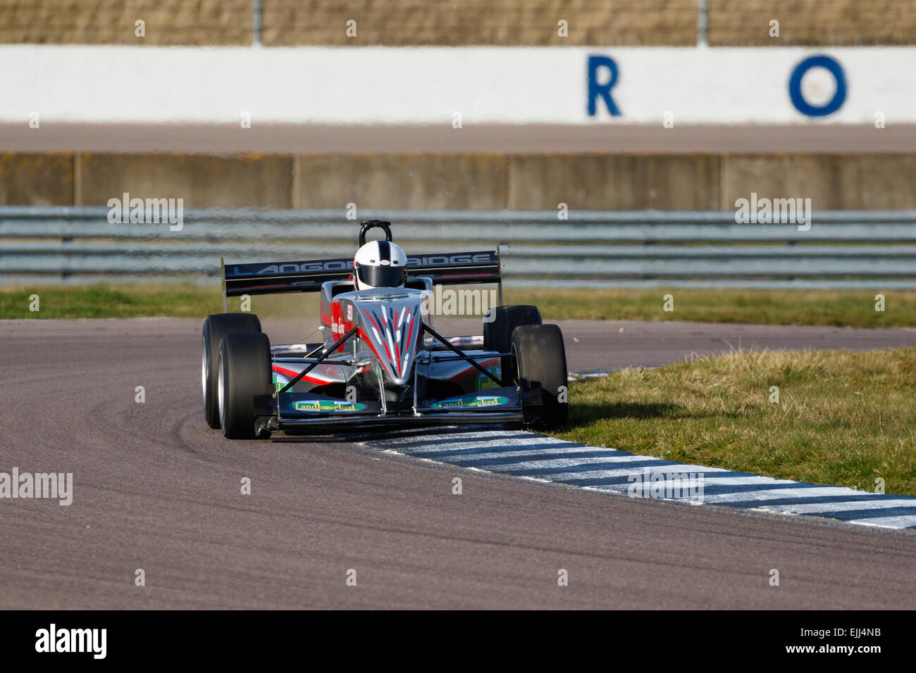A car taking part in the BARC sprint at Rockingham Motor Speedway Stock ...