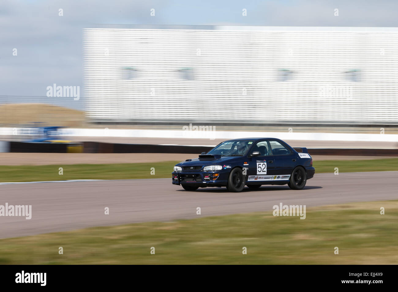 A car taking part in the BARC sprint at Rockingham Motor Speedway Stock ...