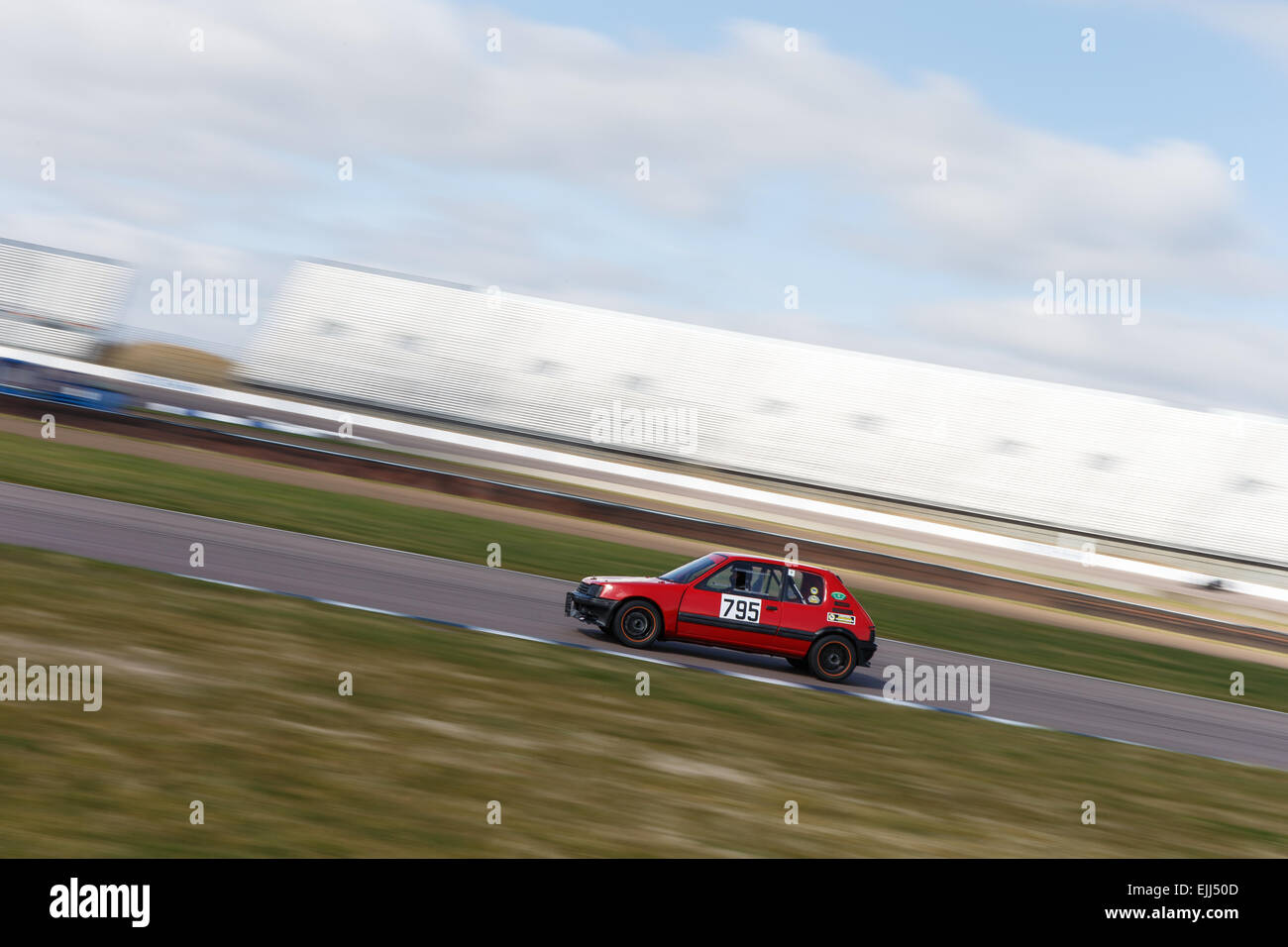 A car taking part in the BARC sprint at Rockingham Motor Speedway Stock ...