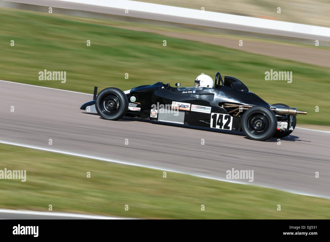 A car taking part in the BARC sprint at Rockingham Motor Speedway Stock ...