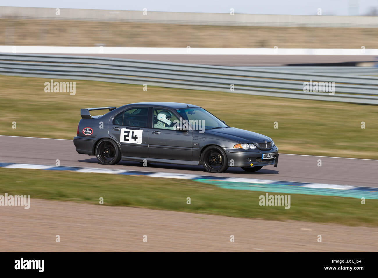 A car taking part in the BARC sprint at Rockingham Motor Speedway Stock ...