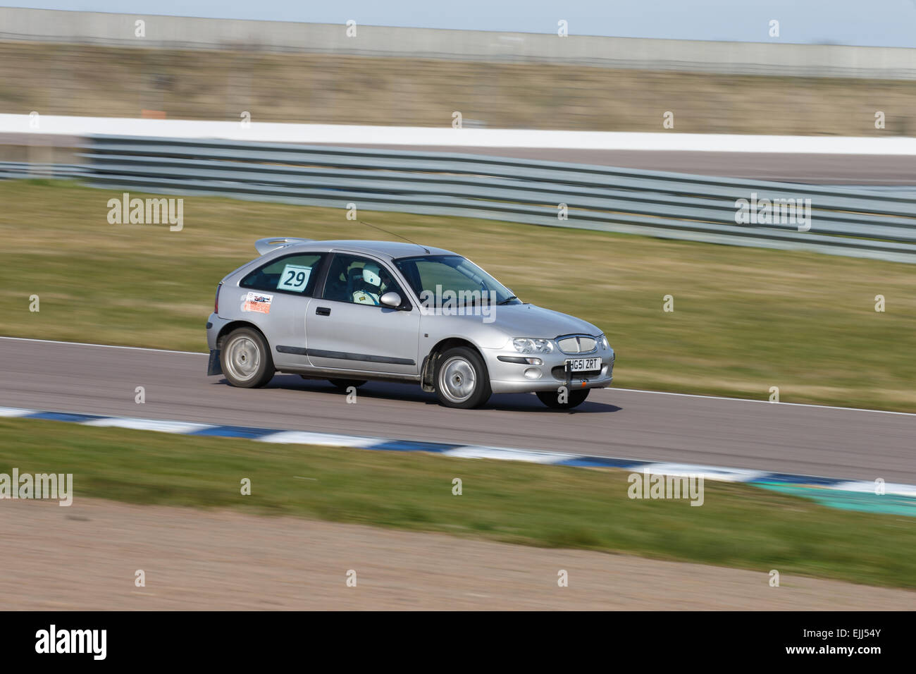 A car taking part in the BARC sprint at Rockingham Motor Speedway Stock ...