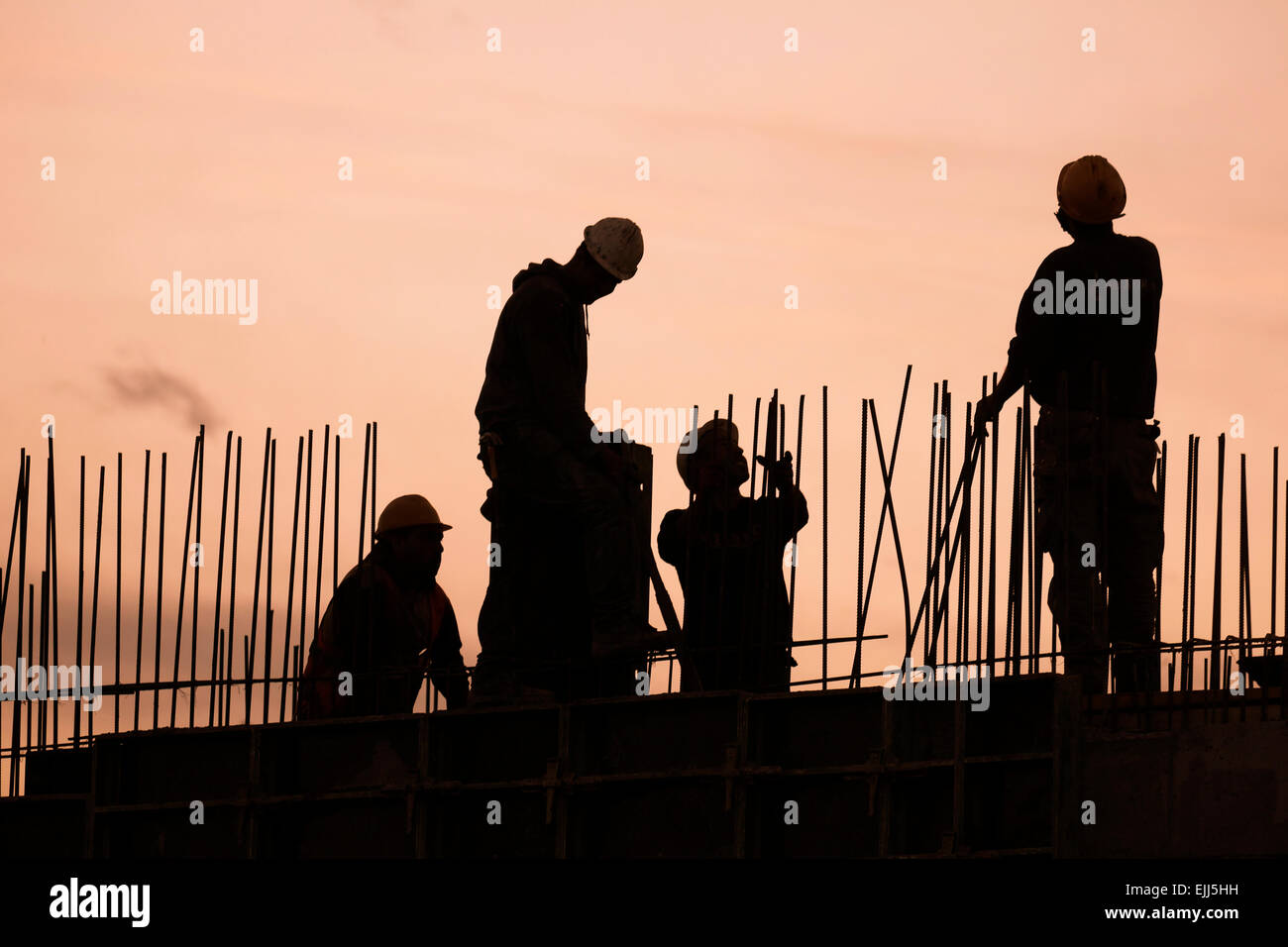 Construction workers in silhouette hi-res stock photography and images ...