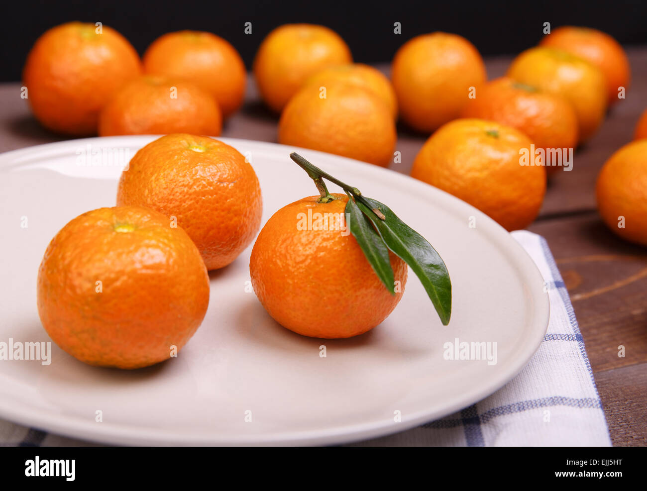 Three tangerines with leaves hi-res stock photography and images - Alamy
