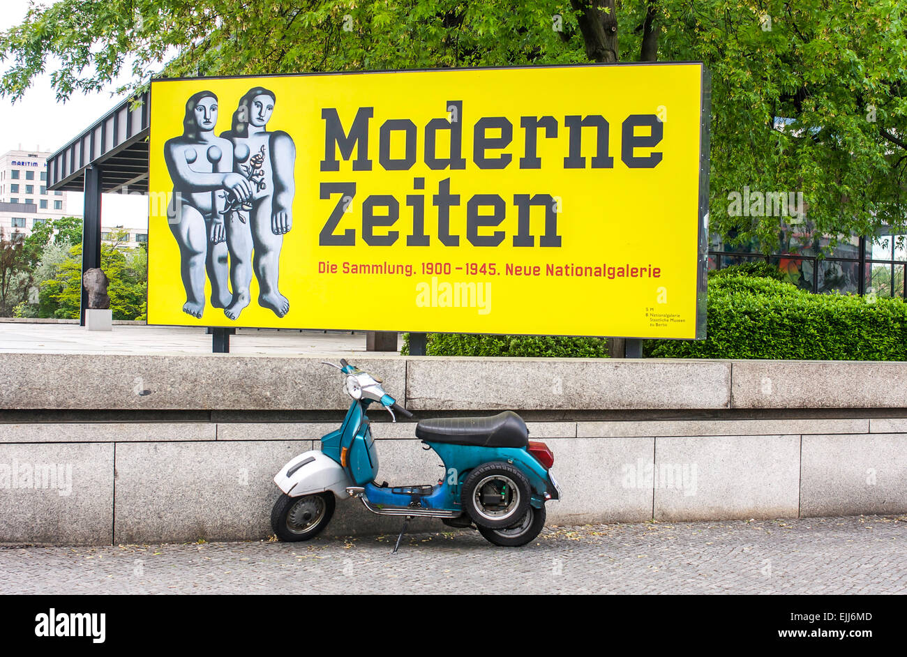A bright yellow billboard advertising a coming exhibit at the Neue ...