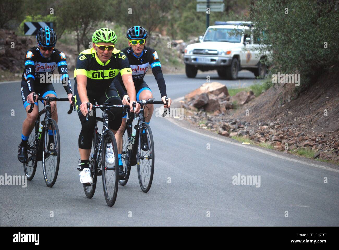 Cycling team on bikes on a mountain road, Gran Canaria, Canary Islands ...