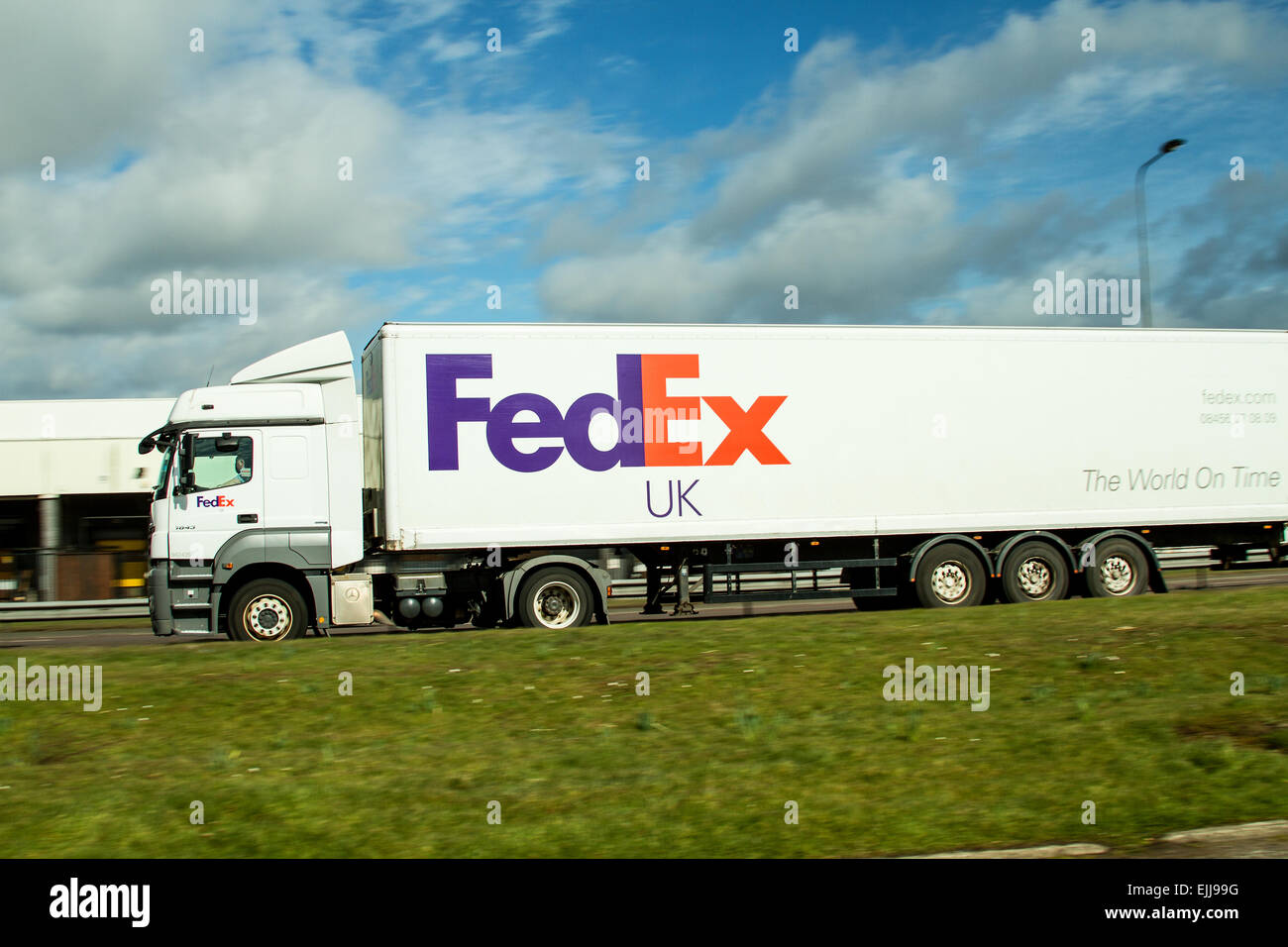 A FedEx UK articulated lorry travelling along the Kingsway Dual ...