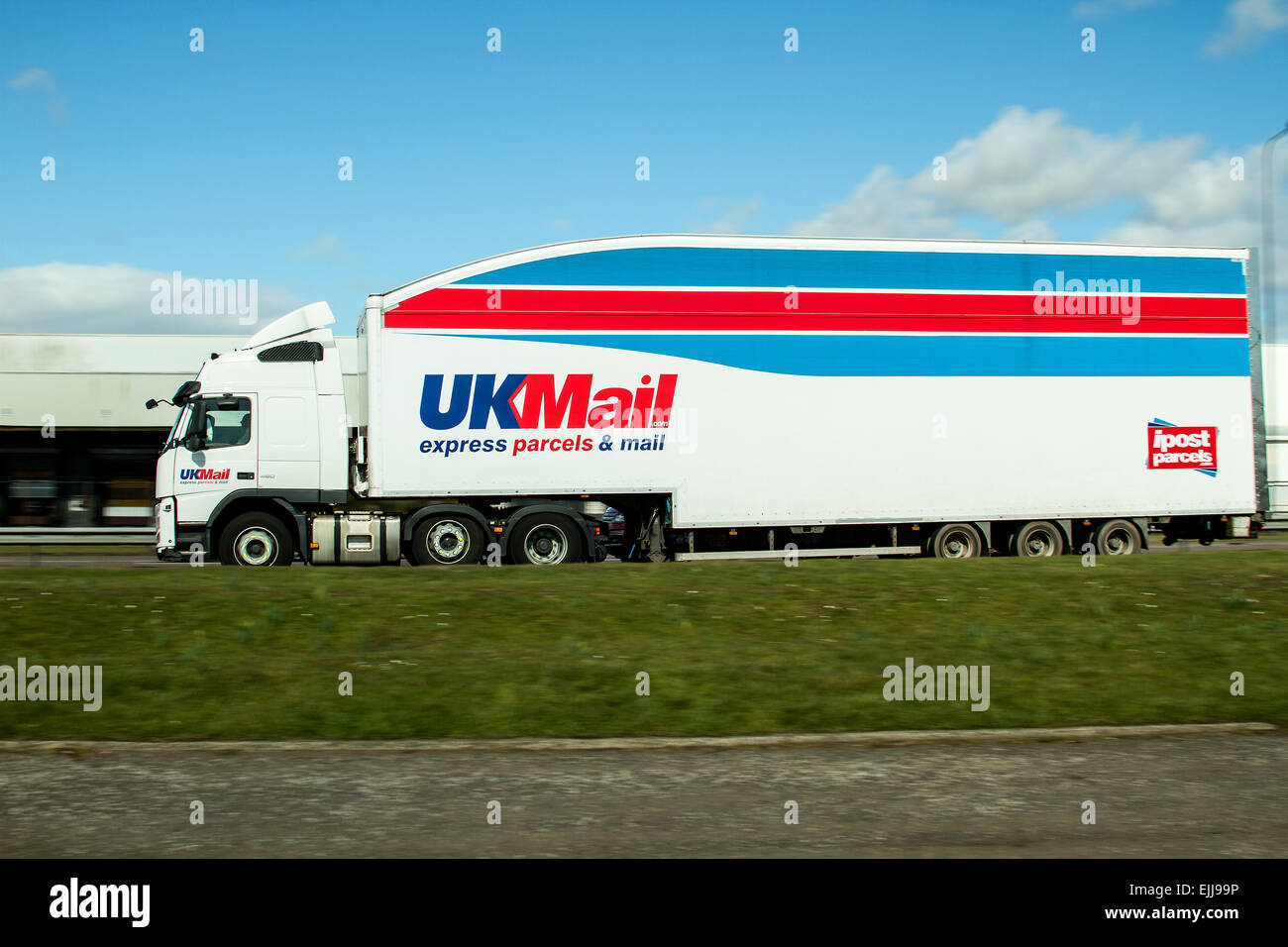 UKMail Express parcels & Mail articulated lorry travelling along the ...