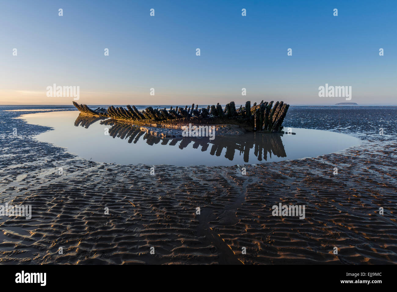 Shipwreck of The SS Nornen at sunset on Berrow Sands near Burnham on ...