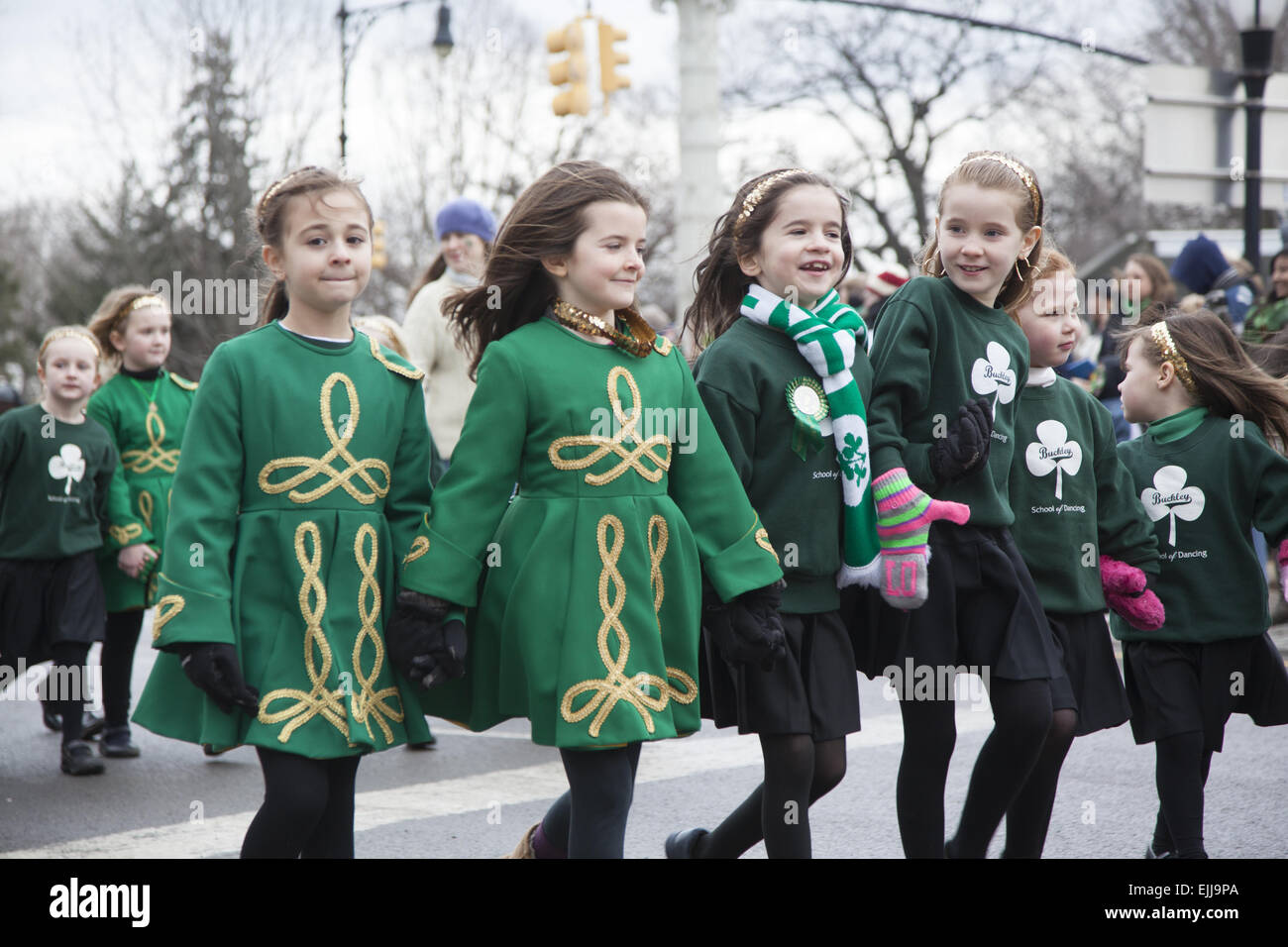 Girls from a local Irish dance school perform at the Irish Day Parade ...