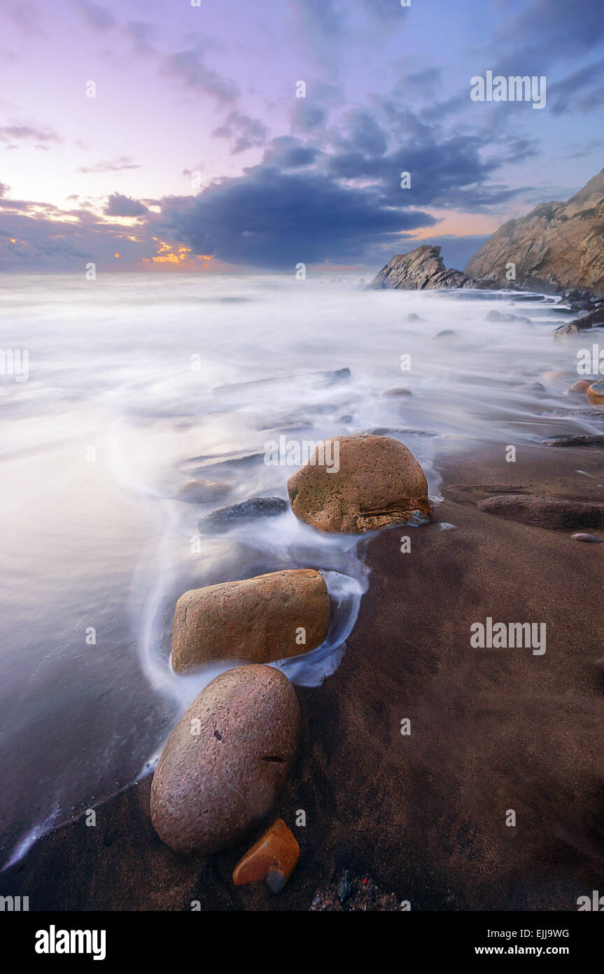 Azkorri beach at the evening Stock Photo - Alamy