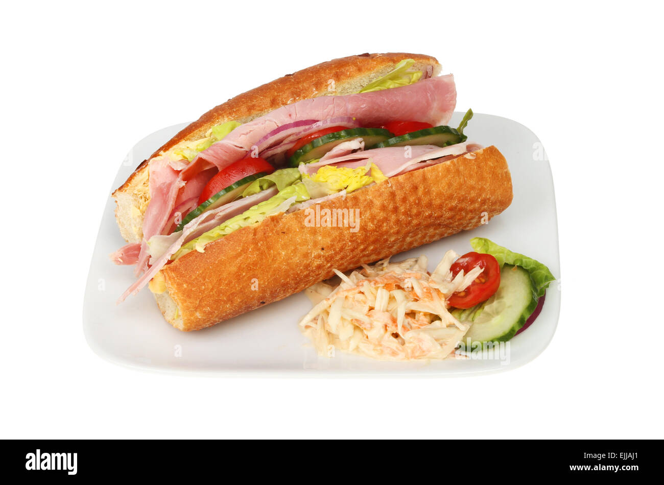 Ham salad roll with coleslaw and salad garnish on a plate isolated ...
