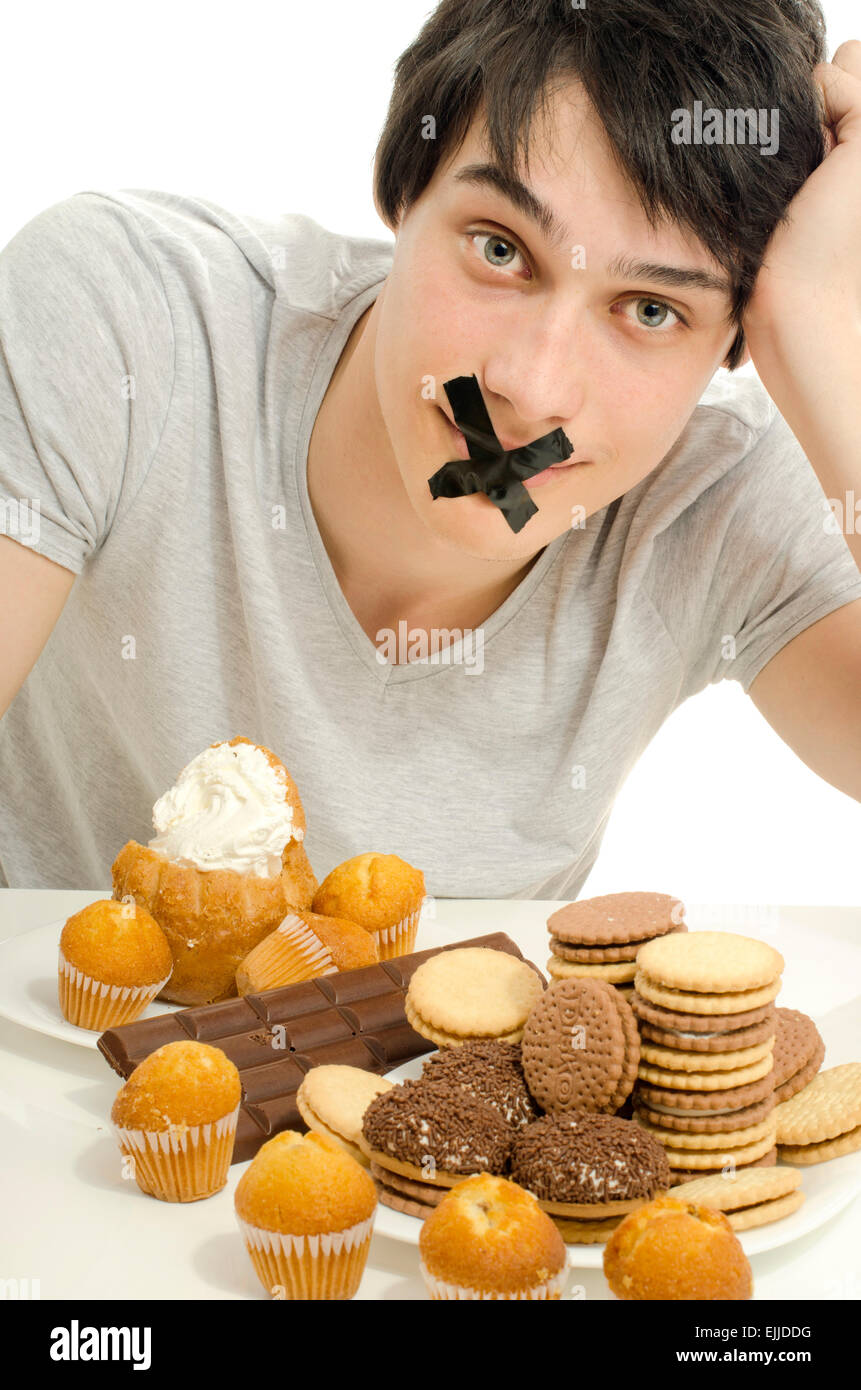 Man in love with sweets, candies,chocolate and sugar but trying to ...