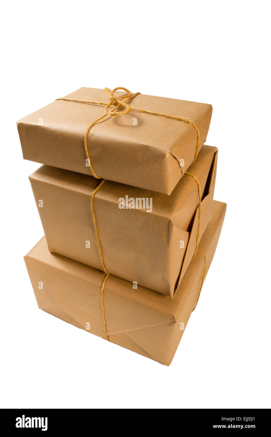 Stack of brown paper wrapped parcels for shipping Stock Photo - Alamy