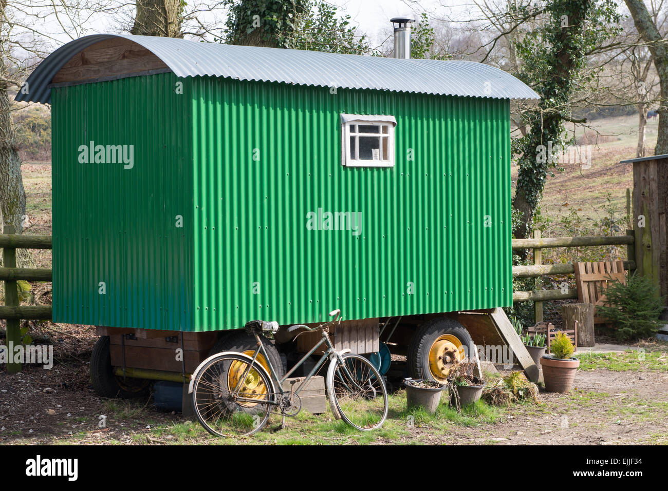 A traditional corrugated iron green Shepherds hut in the New forest ...