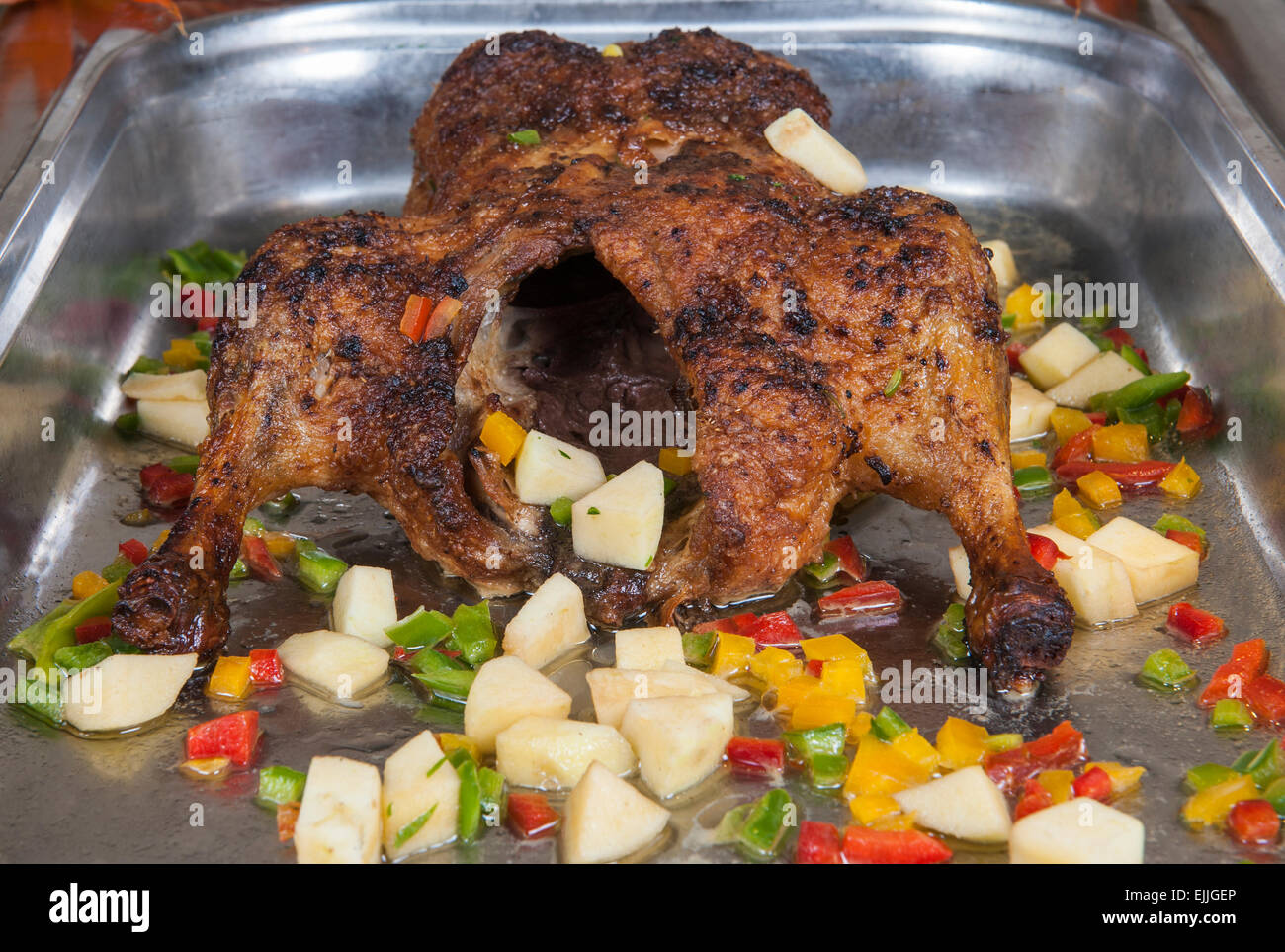 Whole roasted duck with vegetables on display at a hotel restaurant ...