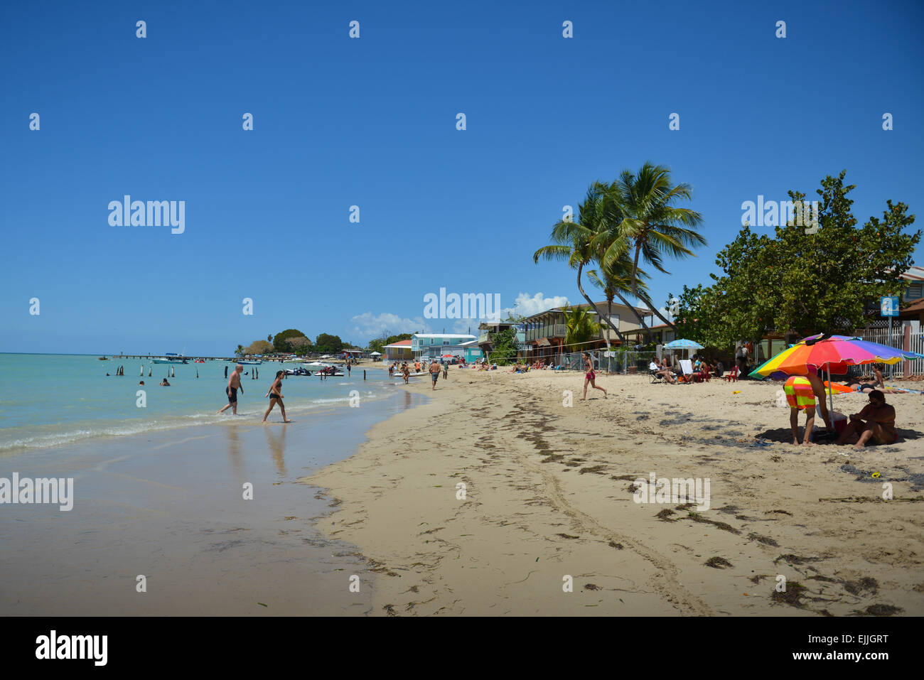 Beach goers having fun at El Combate beach, Cabo Rojo. Puerto Rico. US ...