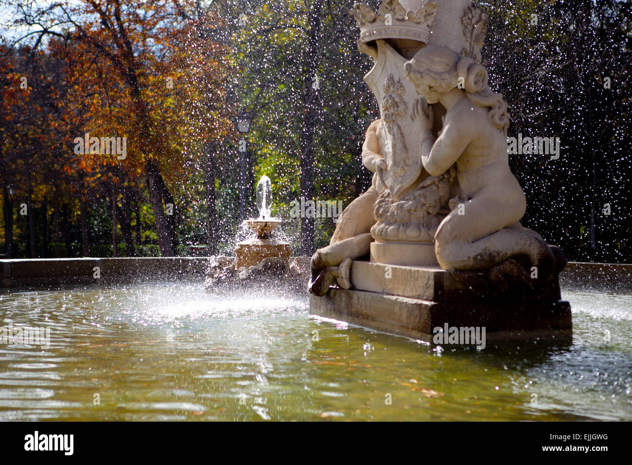 Fountain full of drops in Retiro park in Madrid, Spain. Fall season ...