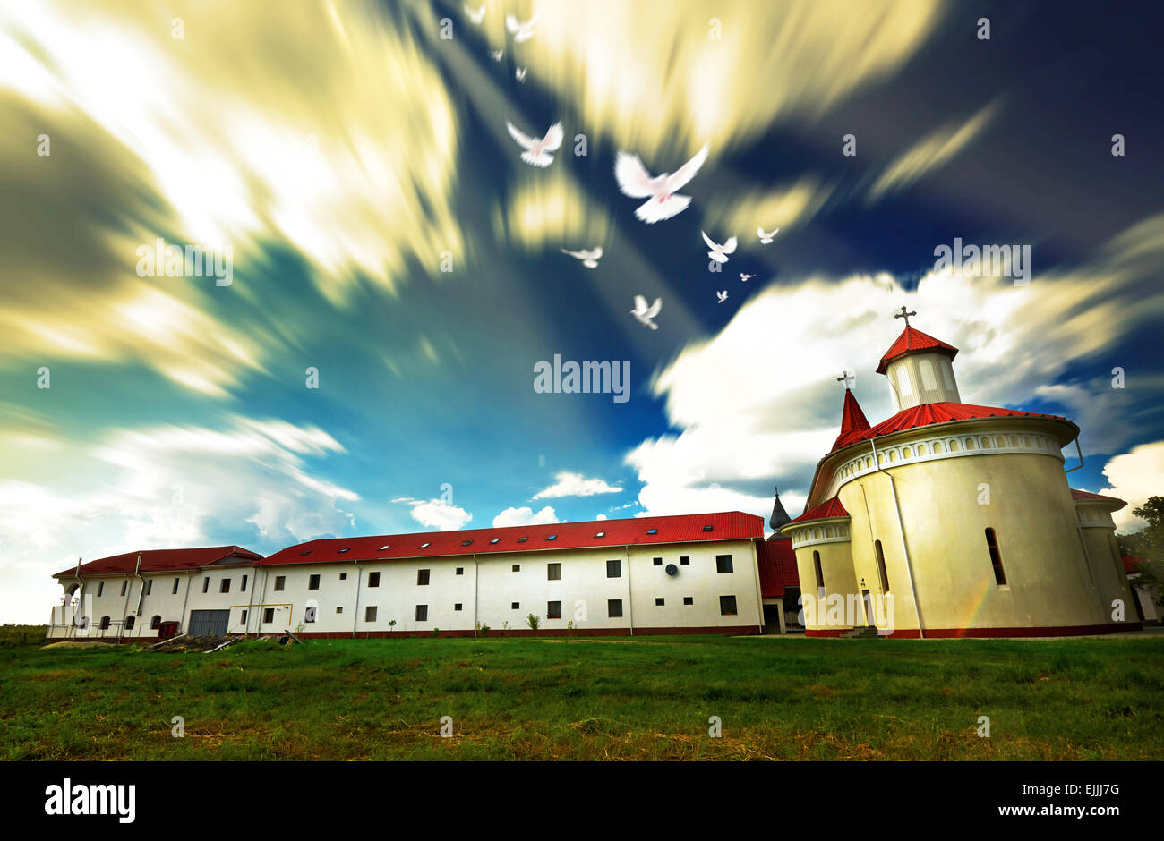 White doves over Sag Monastery in Timis, Romania Stock Photo - Alamy