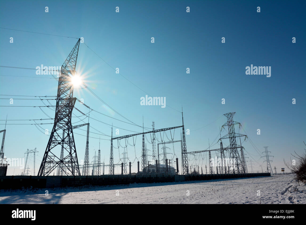 Big electricity plant with many poles Stock Photo - Alamy