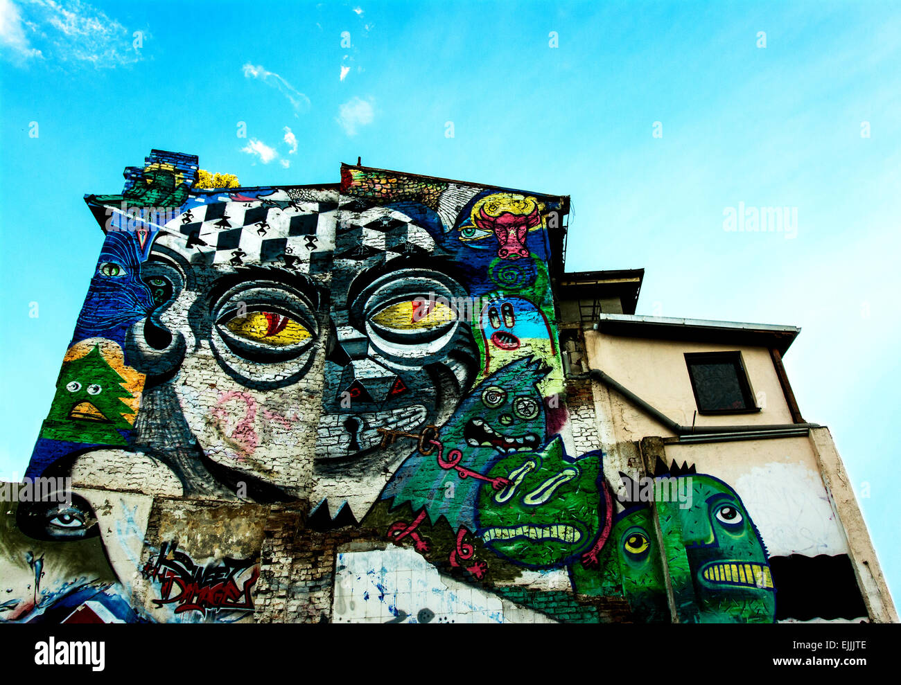 Colorful graffiti in Bucharest, Romania painted by Pisica Stock Photo ...