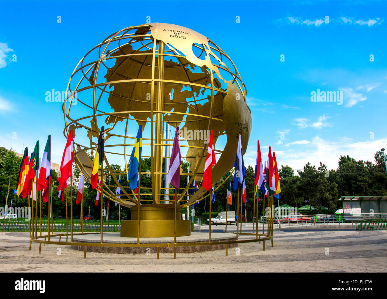 Golden globe with flags in Titan Park, Bucharest, Romania Stock Photo ...