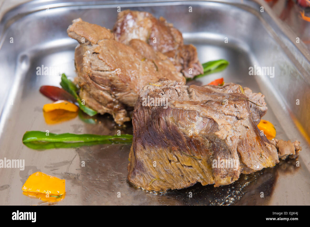 Two chunks of roast beef on display at a hotel restaurant buffet Stock ...