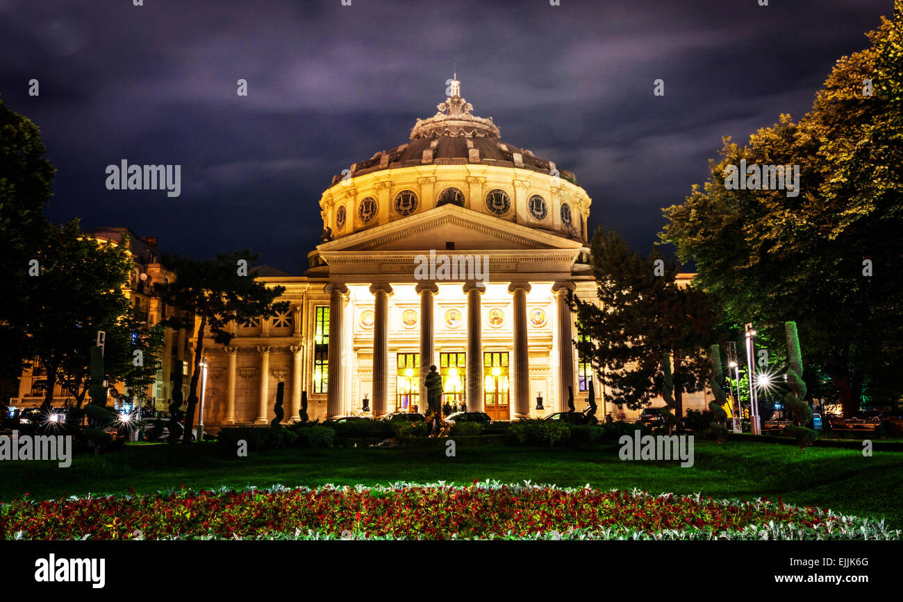 Bucharest Athenaeum building on a cloudy night Stock Photo - Alamy